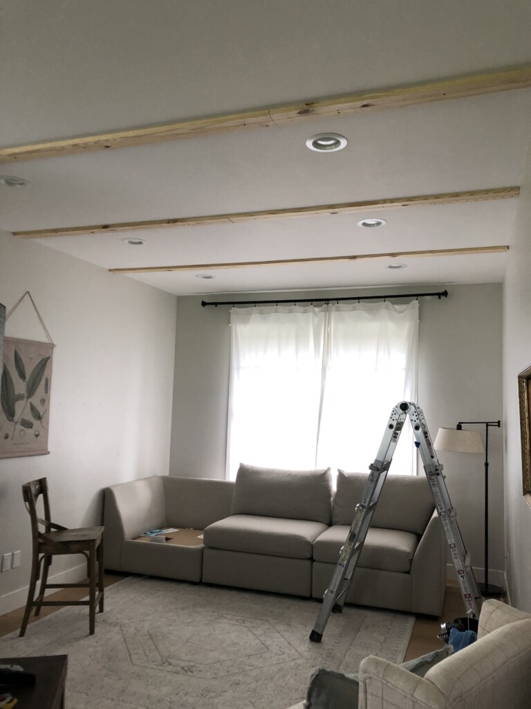 Adding Rustic Faux Beams in the Living Room - Handmade Farmhouse