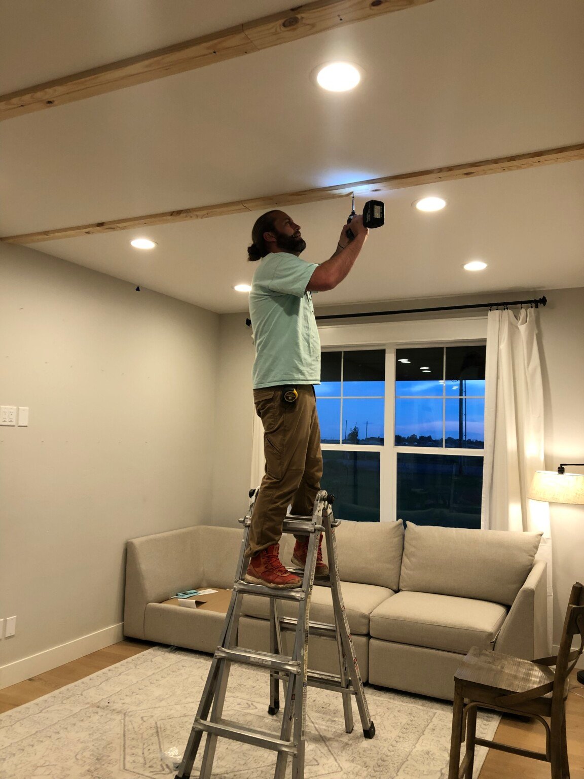 Adding Rustic Faux Beams in the Living Room - Handmade Farmhouse